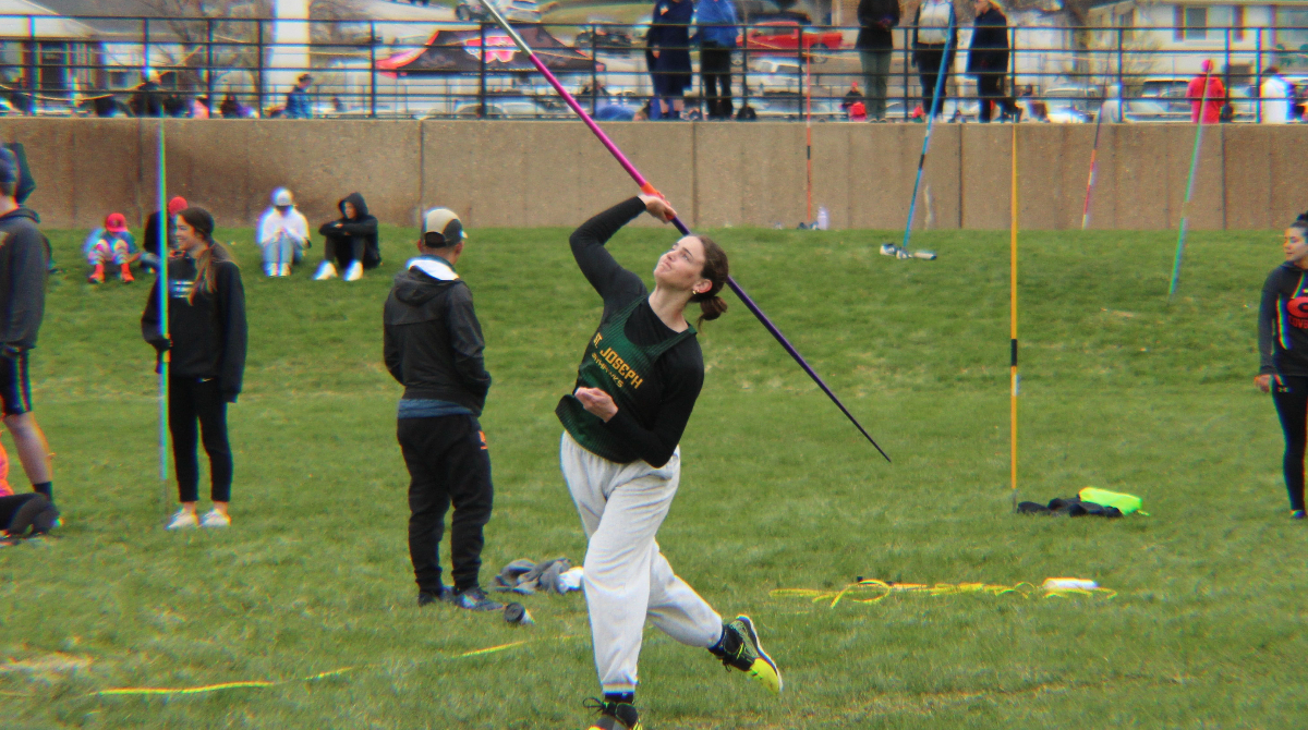 High school track and field: Sarah Snell “stands tall” on and off the ...